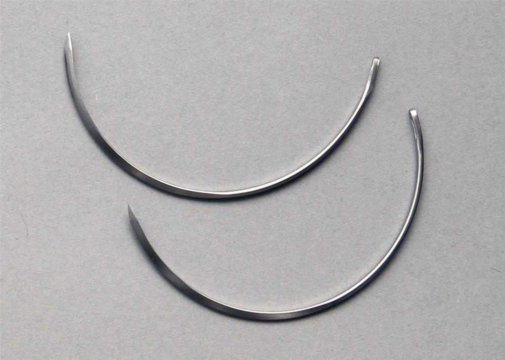 Reverse cutting needle store